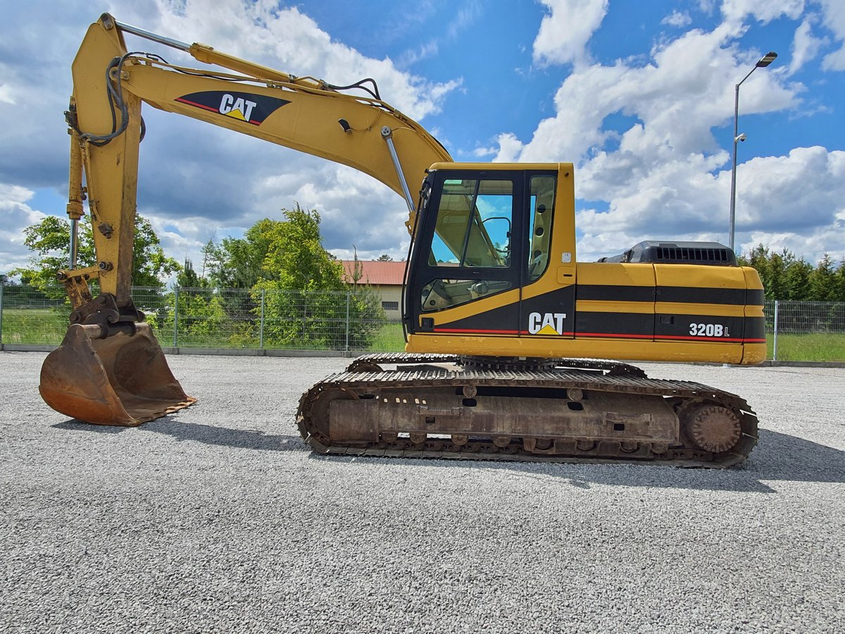 Dawid Gwóźdź - Maszyny budowlane - CATERPILLAR 320 BL