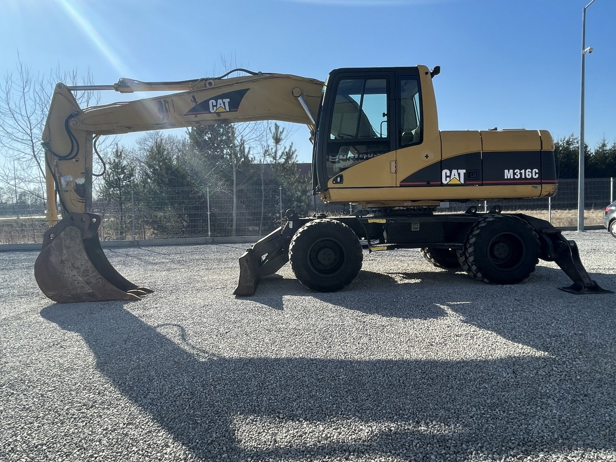 Dawid Gwóźdź - Maszyny budowlane - CATERPILLAR M316C