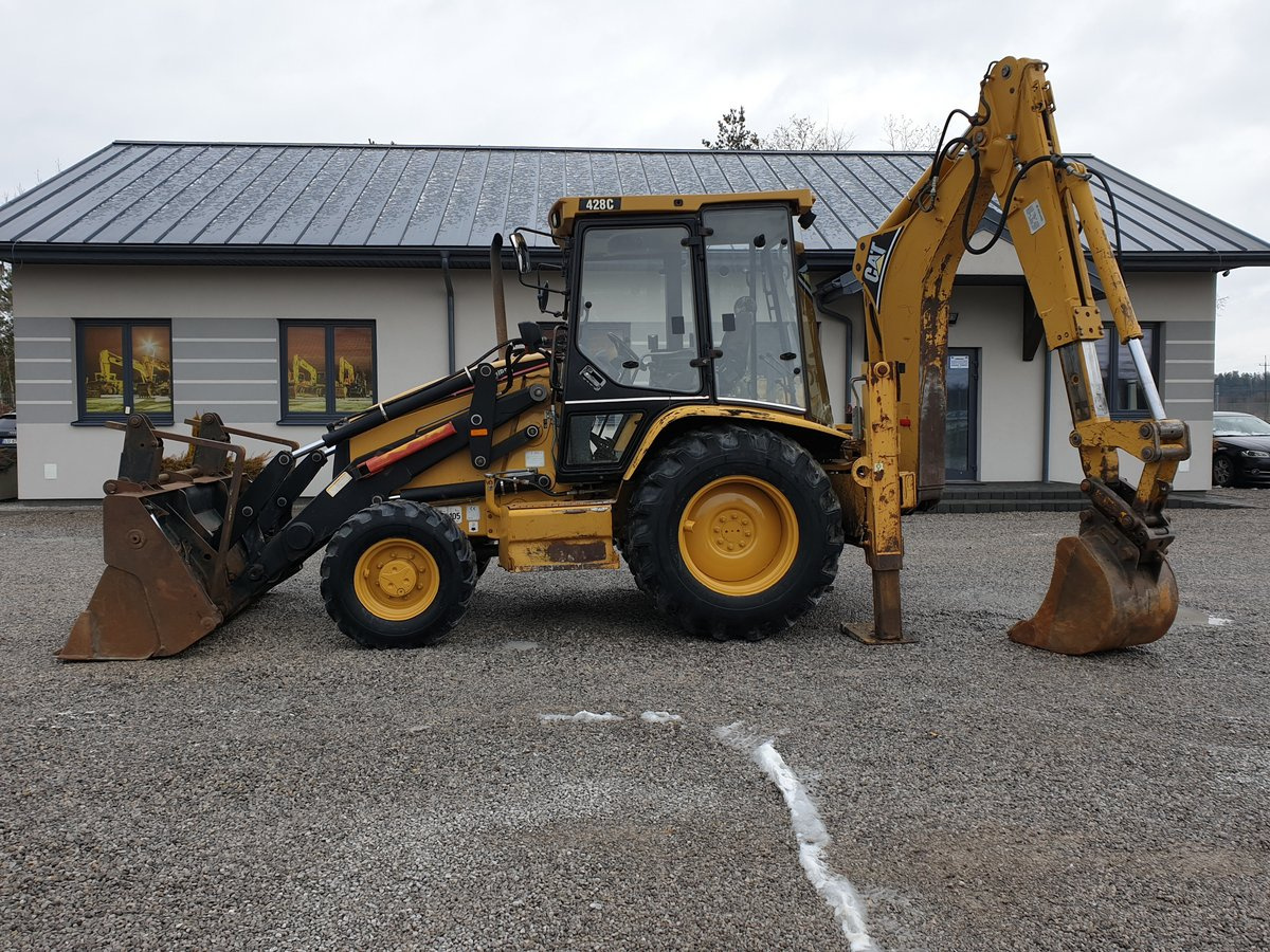 Dawid Gwóźdź - Maszyny budowlane - CATERPILLAR 428C