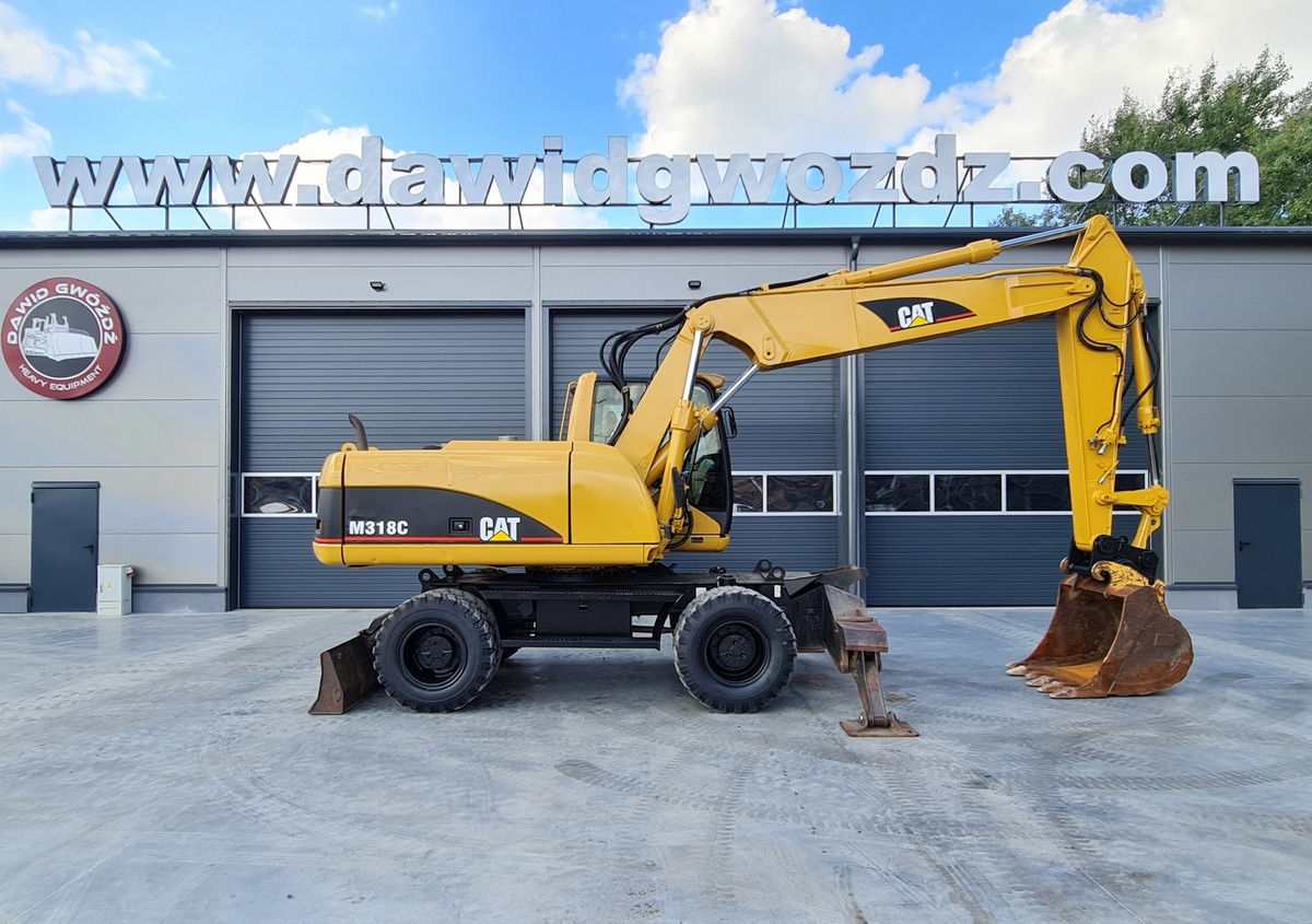 Dawid Gwóźdź - Maszyny budowlane - CATERPILLAR M318C