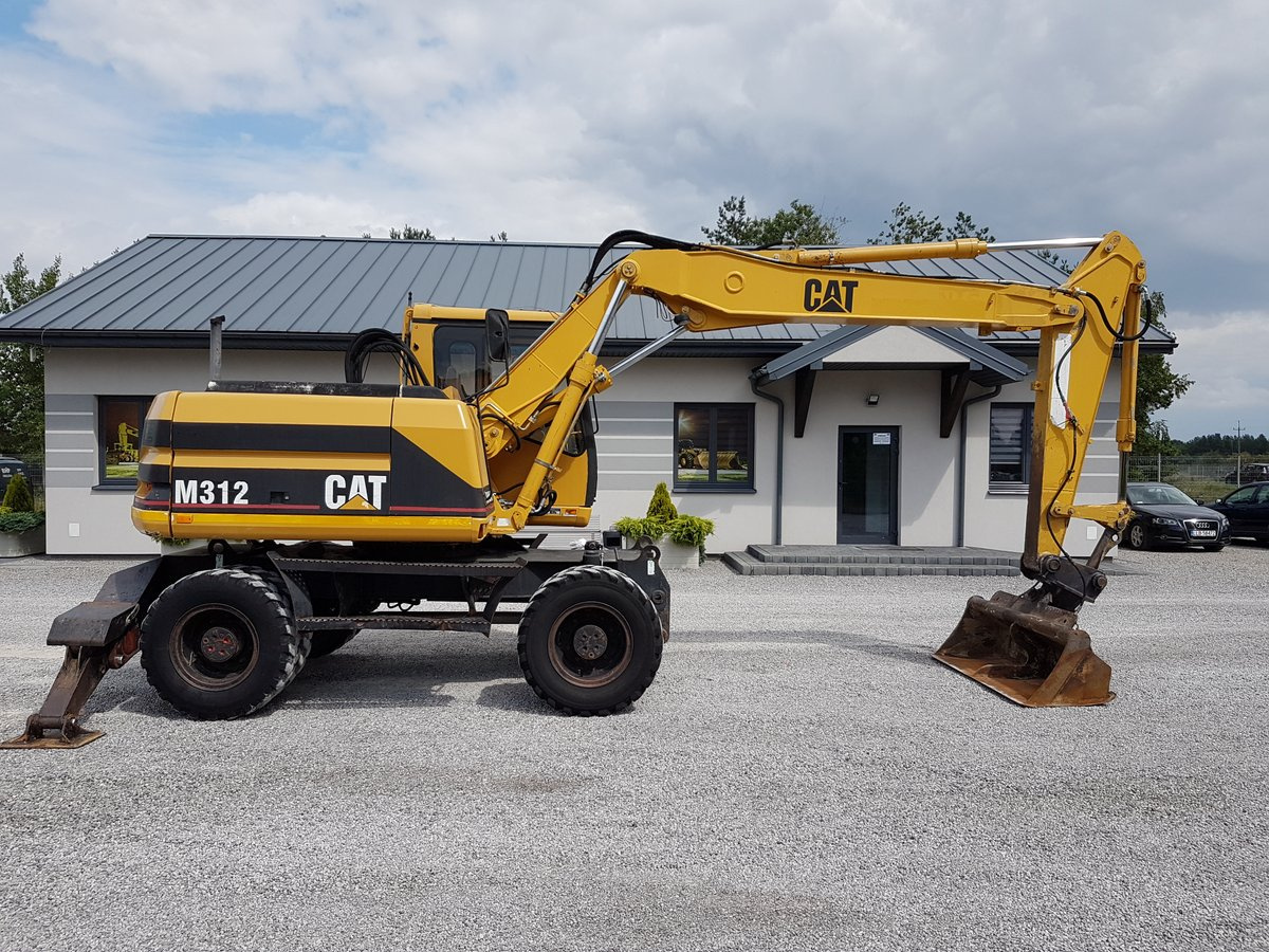 Dawid Gwóźdź - Maszyny budowlane - CATERPILLAR M312