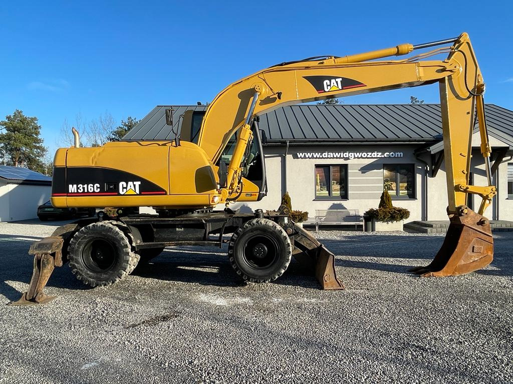 Dawid Gwóźdź - Maszyny budowlane - CATERPILLAR M316C