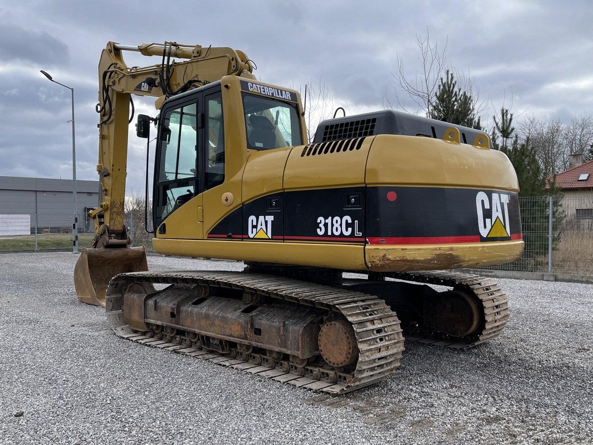 Dawid Gwóźdź - Maszyny budowlane - CATERPILLAR 318C