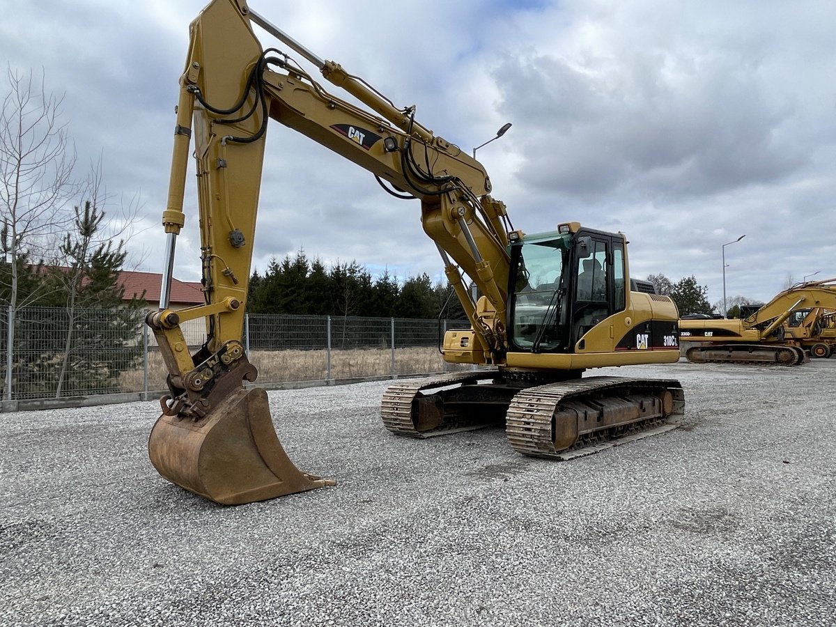 Dawid Gwóźdź - Maszyny budowlane - CATERPILLAR 318C