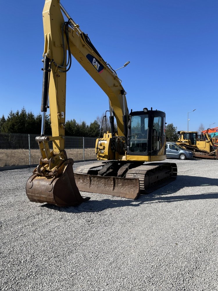 Dawid Gwóźdź - Maszyny budowlane - CATERPILLAR 314CR