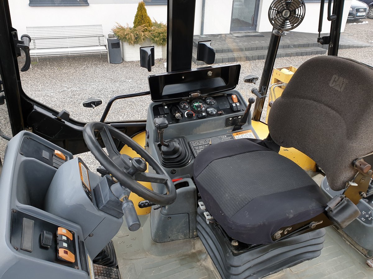 Dawid Gwóźdź - Maszyny budowlane - CATERPILLAR 428C