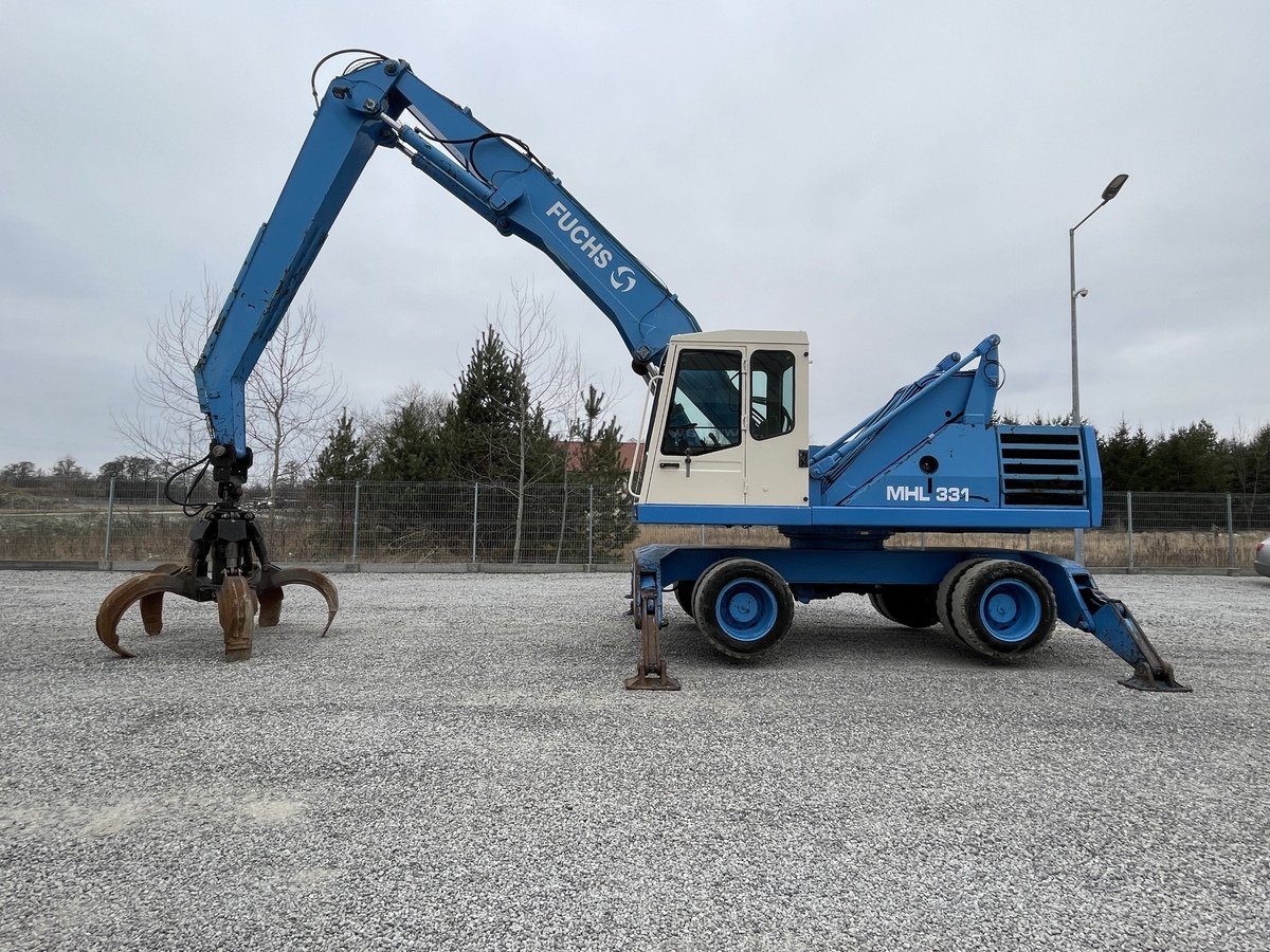 Dawid Gwóźdź - Maszyny budowlane - FUCHS MHL331