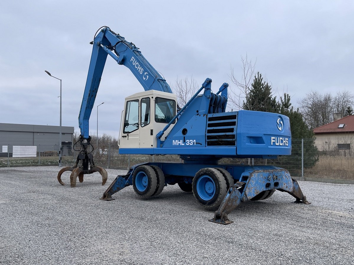 Dawid Gwóźdź - Maszyny budowlane - FUCHS MHL331