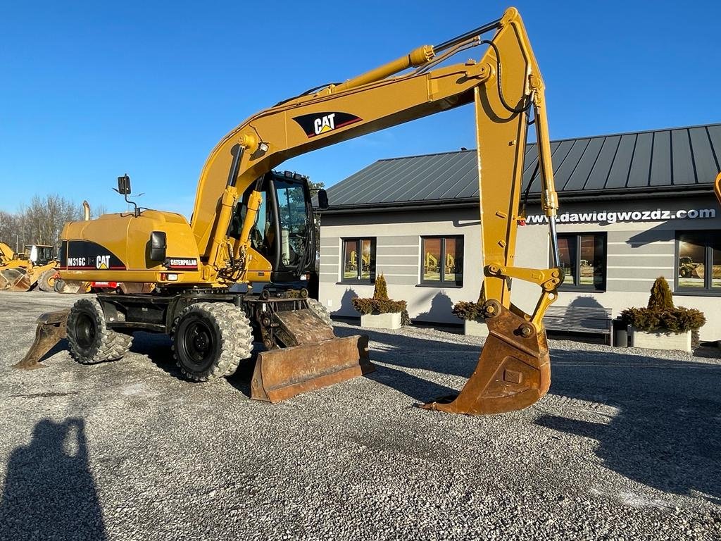 Dawid Gwóźdź - Maszyny budowlane - CATERPILLAR M316C
